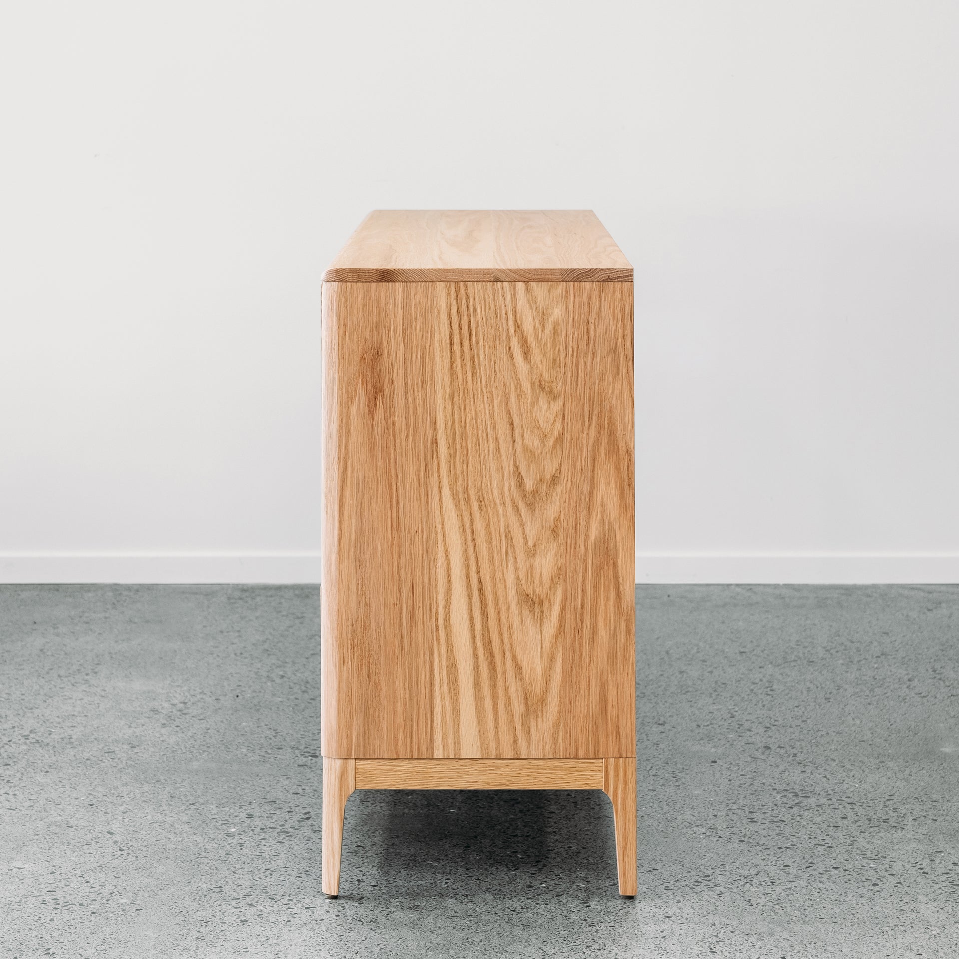 Ghost 7 drawer lowboy red oak |Stacks |Wellington – Stacks Furniture Store